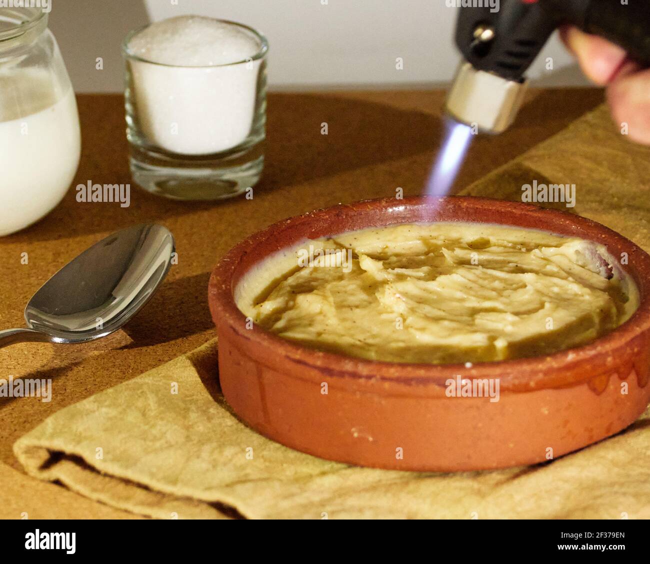 Burn portion of crema catalana dessert and decorated with its ...
