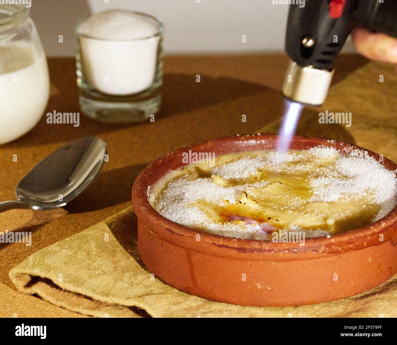 Burn portion of crema catalana dessert and decorated with its ...