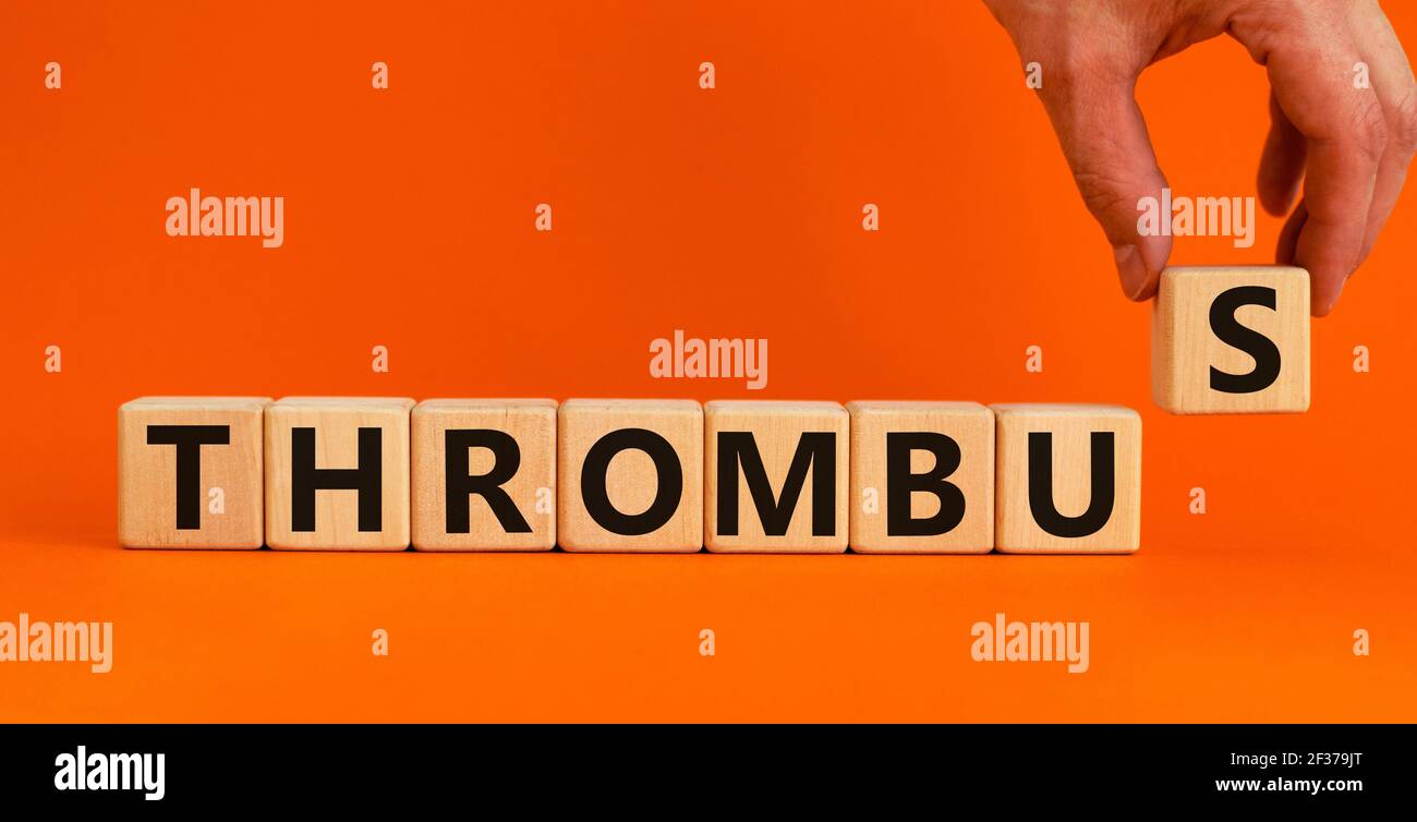 Medical and and thrombus symbol. Wooden cubes with the word 'thrombus ...