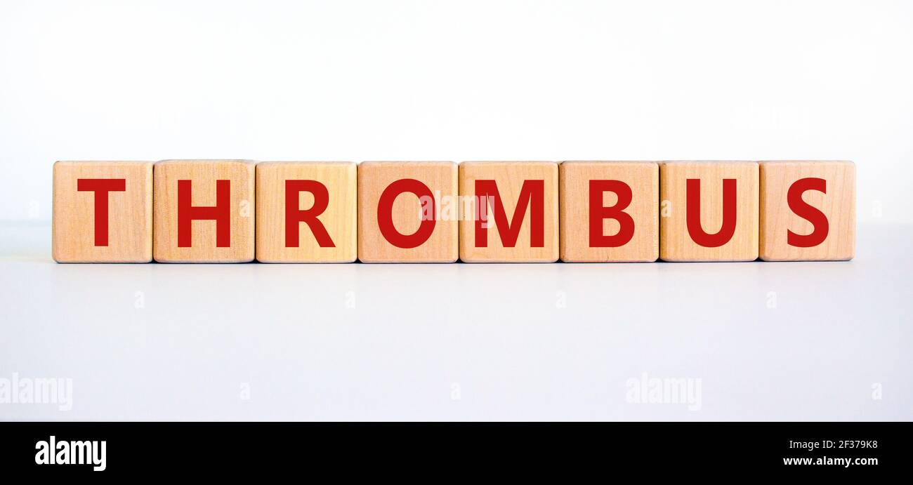 Medical and and thrombus symbol. Wooden cubes with the word 'thrombus ...