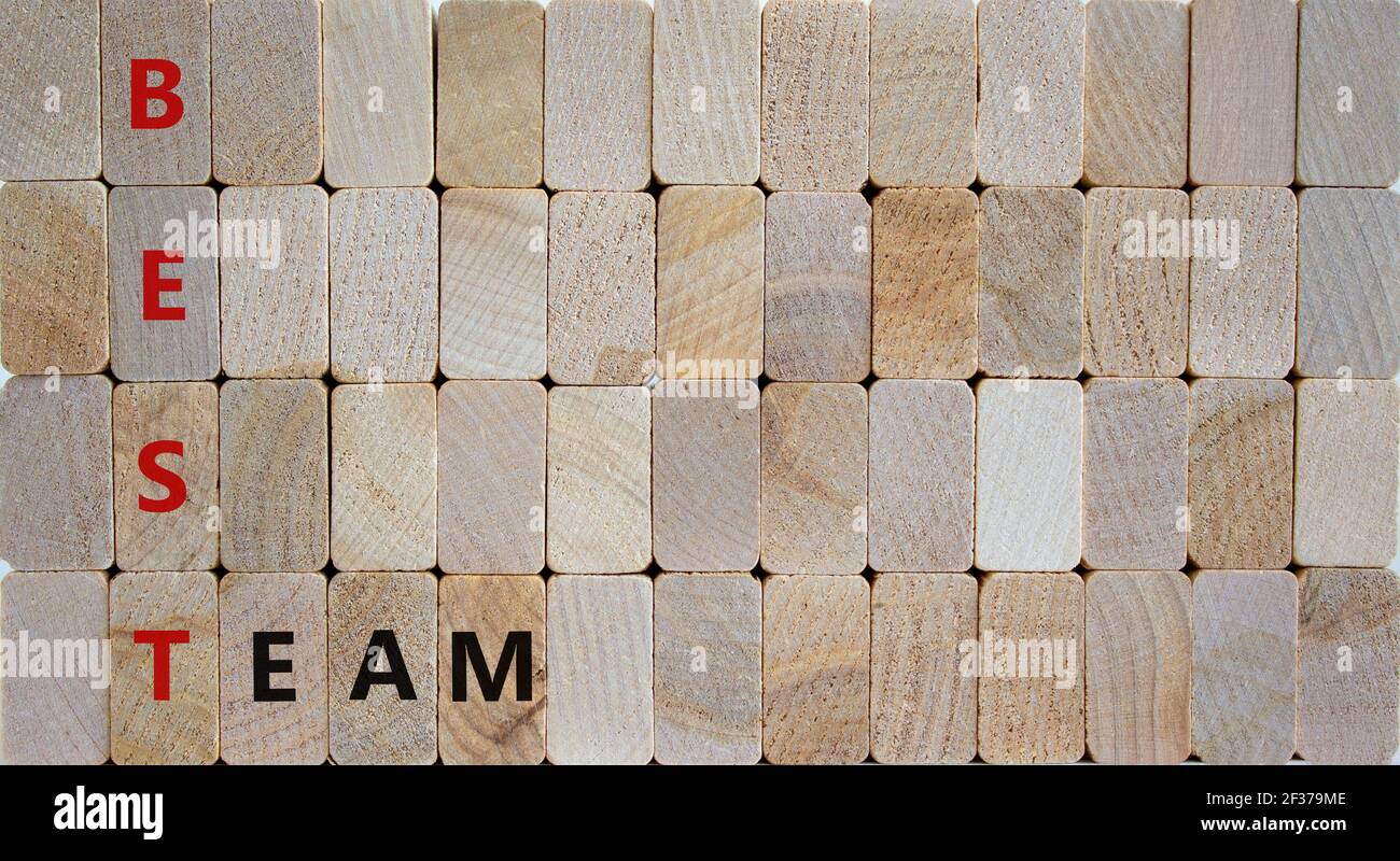 Best team symbol. Woden blocks with words 'best team'. Beautiful wooden ...