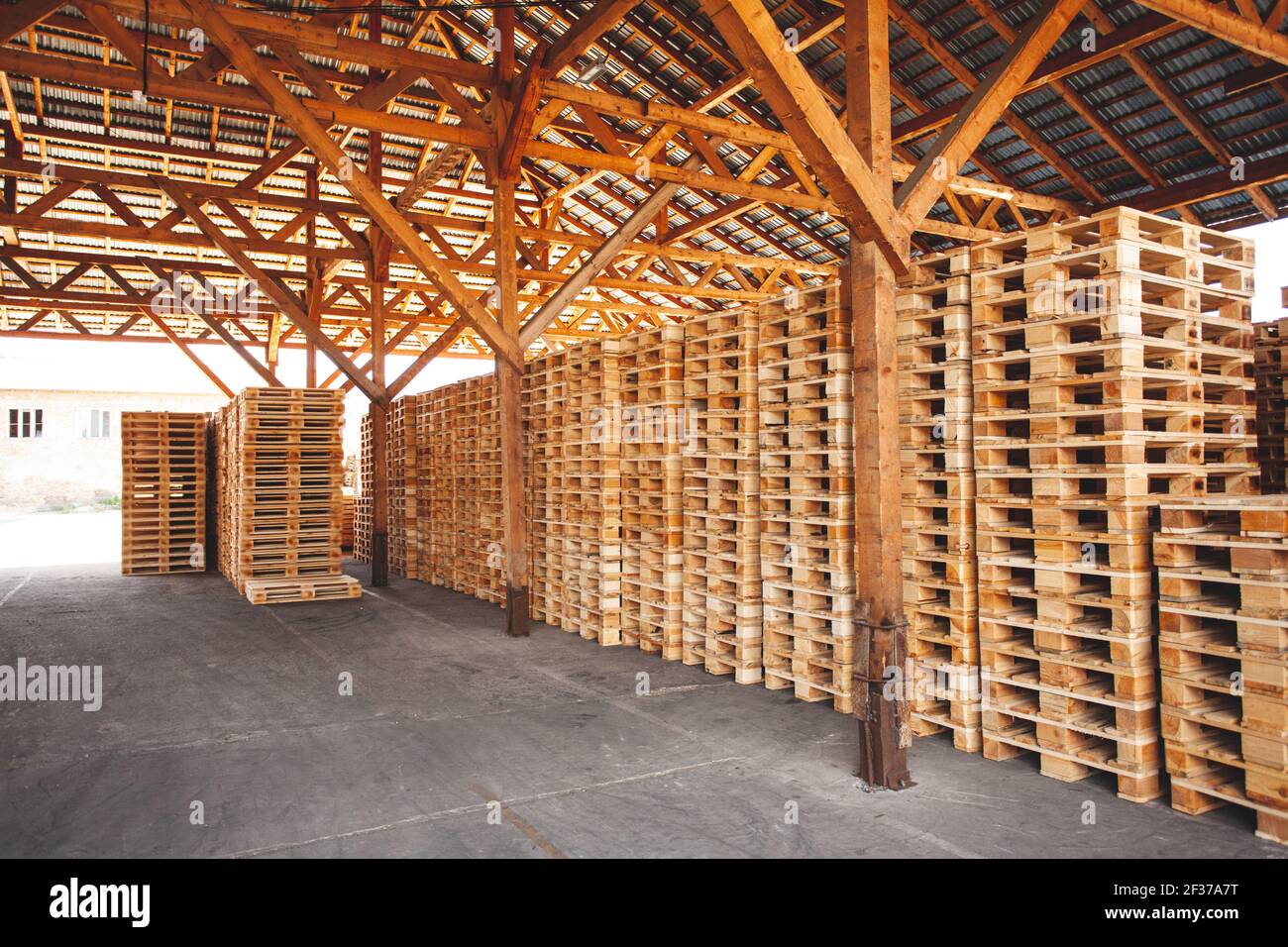 The wooden pallets stacked on top of each other Stock Photo - Alamy