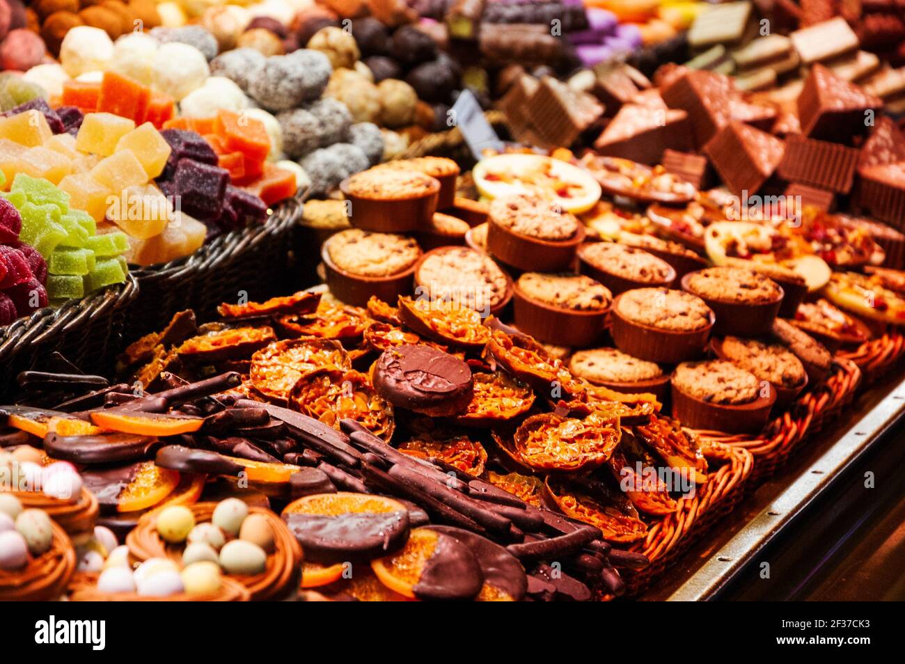Traditional sweets at famous La Boqueria market in Barcelona, Catalonia ...