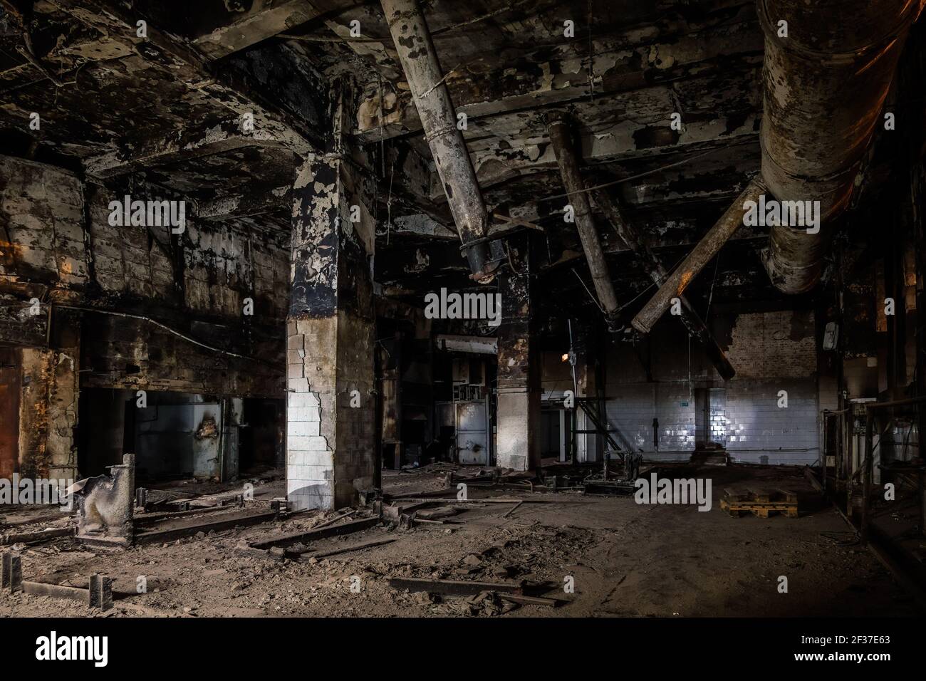 Burnt and ruined interior of industrial building after fire ...