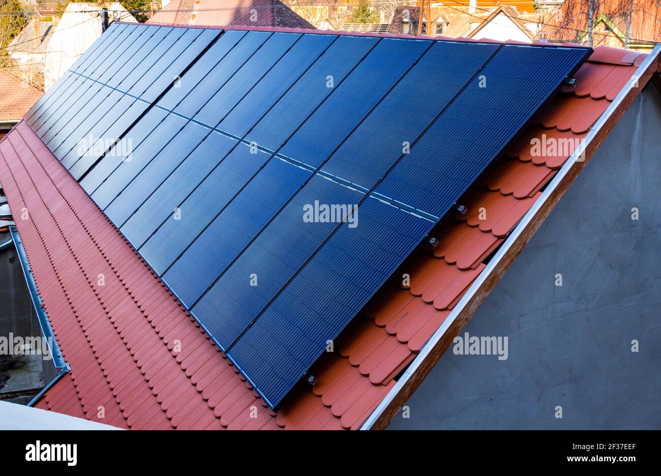 Solar panels installed on roof of renovated house Stock Photo - Alamy