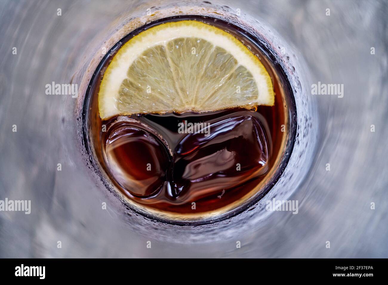 Cold tea with lemon in glass Stock Photo - Alamy