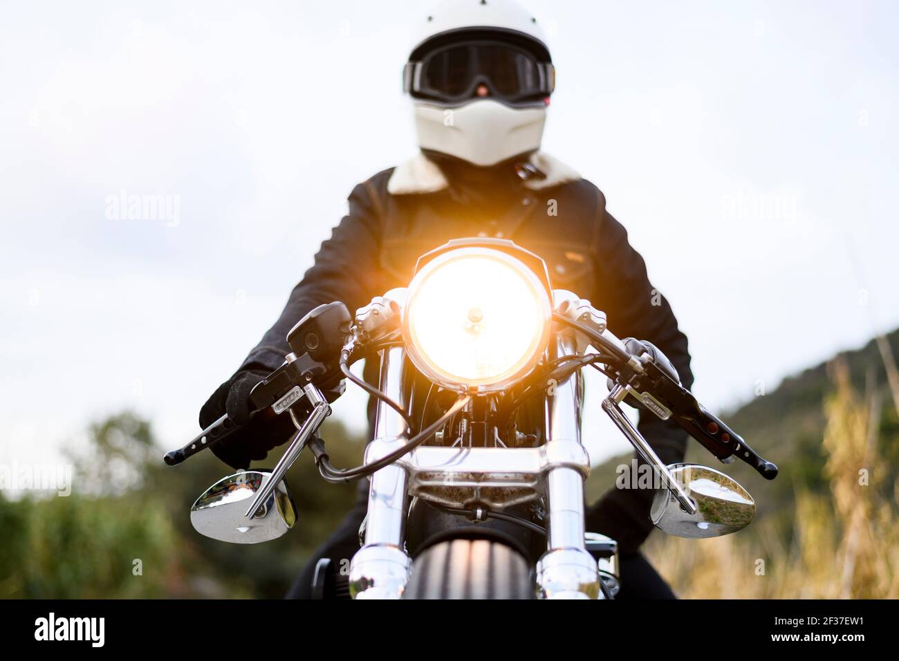 Biker riding motorcycle low angle hi-res stock photography and images ...