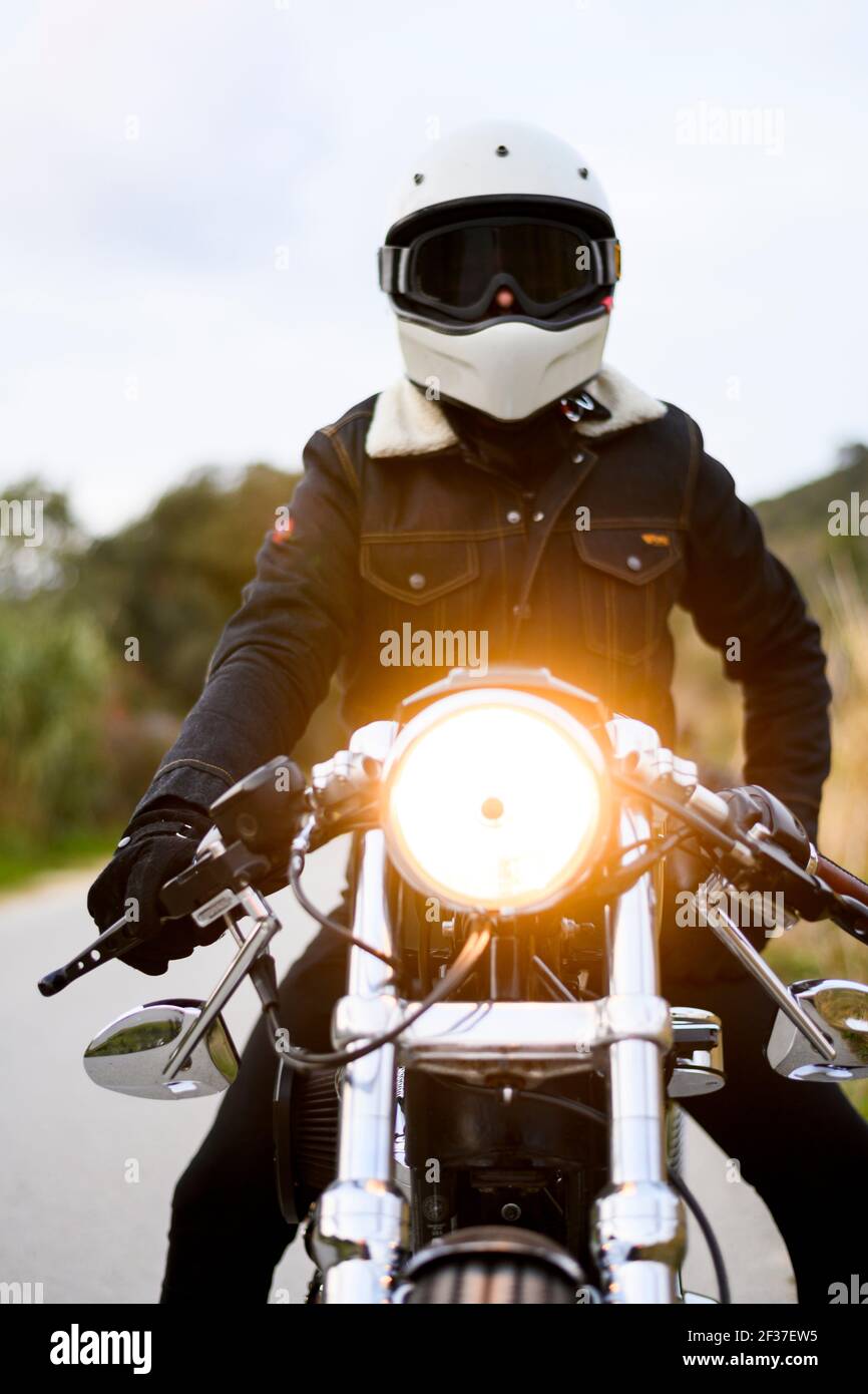 Biker riding motorcycle low angle hi-res stock photography and images ...
