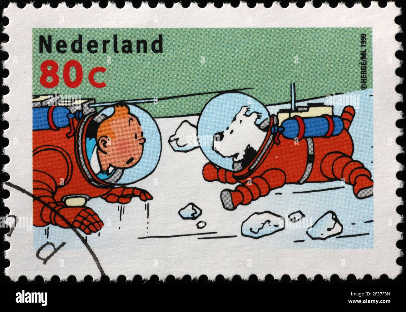 Tintin and his dog on postage stamp Stock Photo - Alamy