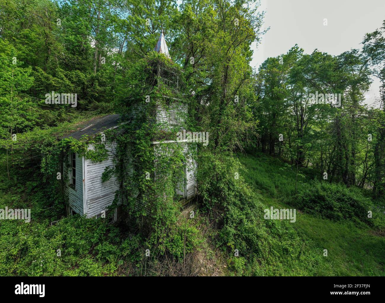 Overgrown church hi-res stock photography and images - Alamy