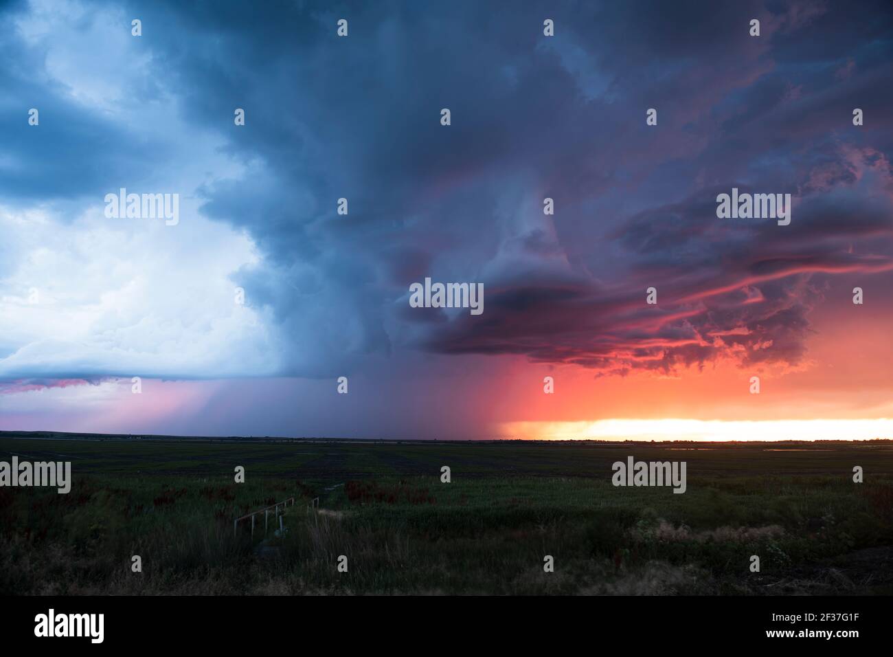 Colorful Clouds as Storm Breaks during Sunrise Stock Photo - Alamy