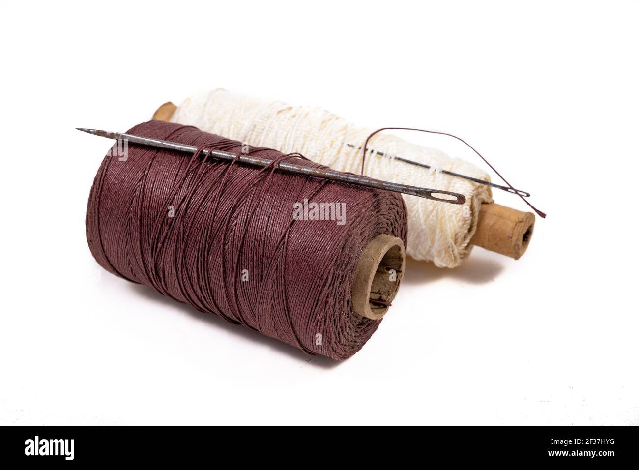 Strong twine and old heavy tailoring needles. Accessories used in a ...