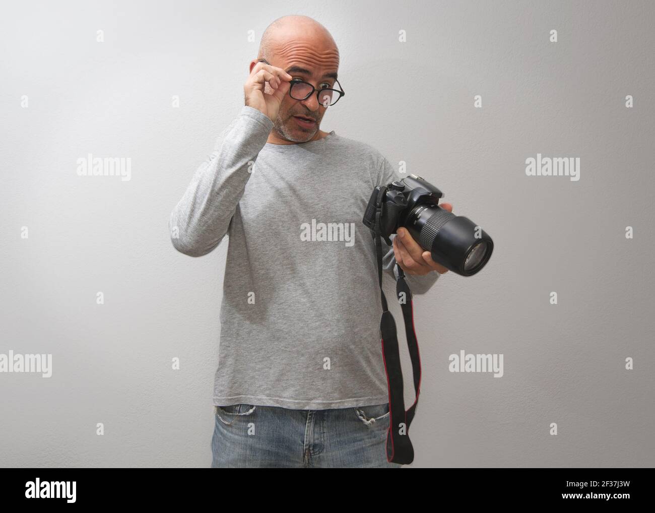 Surprised man looking camera in hi-res stock photography and images - Alamy