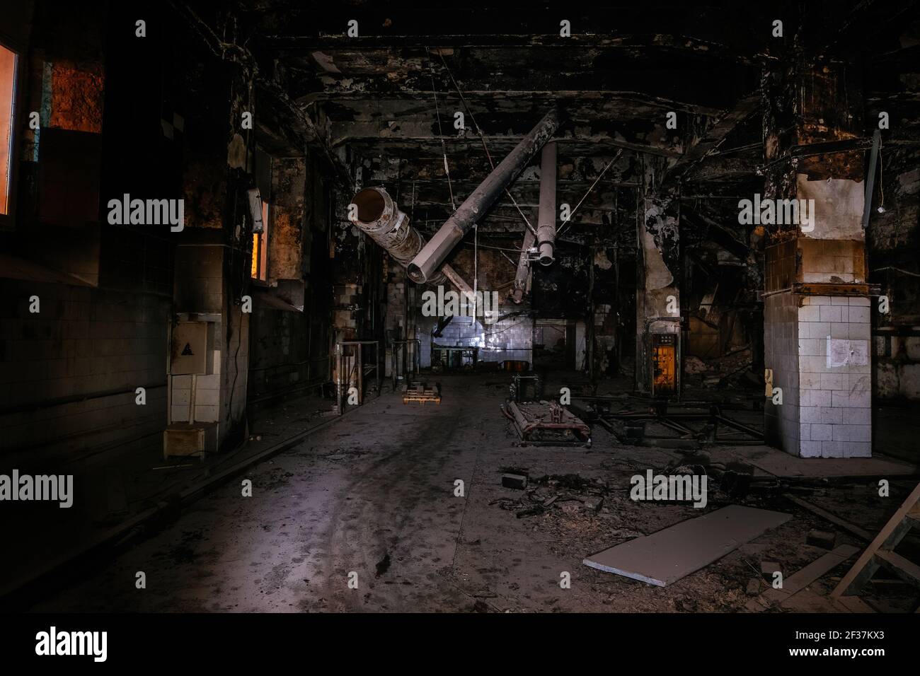 Burnt interior of industrial building or warehouse. Consequences of ...