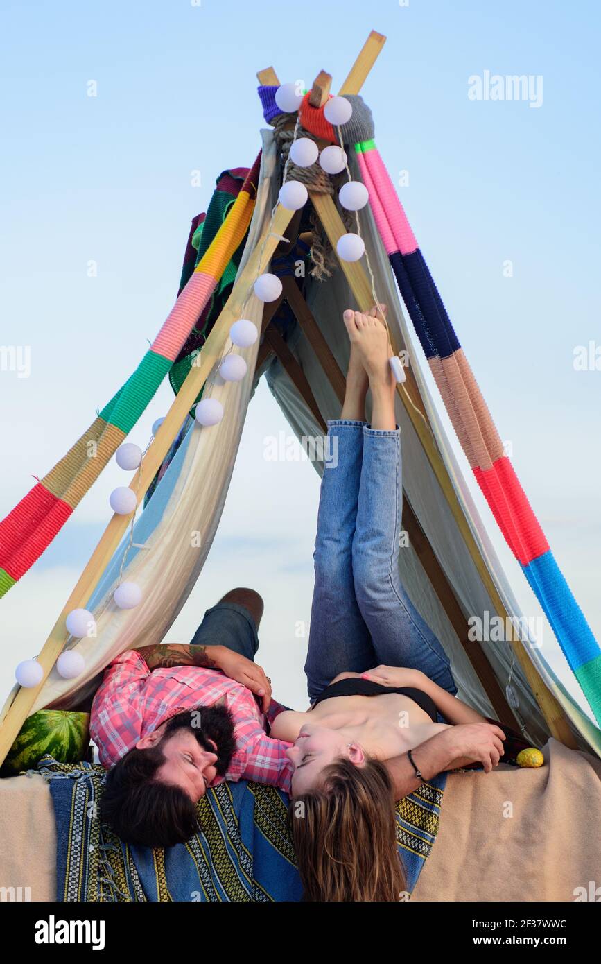 Loving family in tent. Couple in love in camping. Portrait of happy man ...