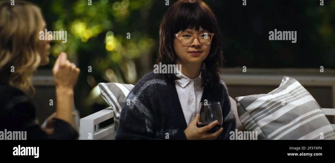 HAPPILY, from left: Natalie Zea, Charlyne Yi, 2021. © Saban Films ...