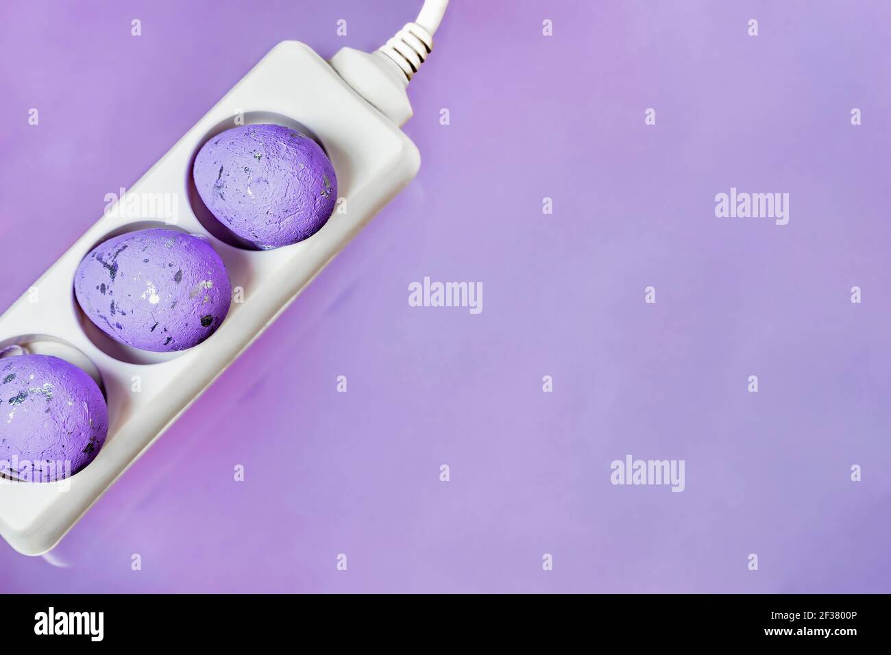 Happy Easter greeting card with electrical switch on purple background ...