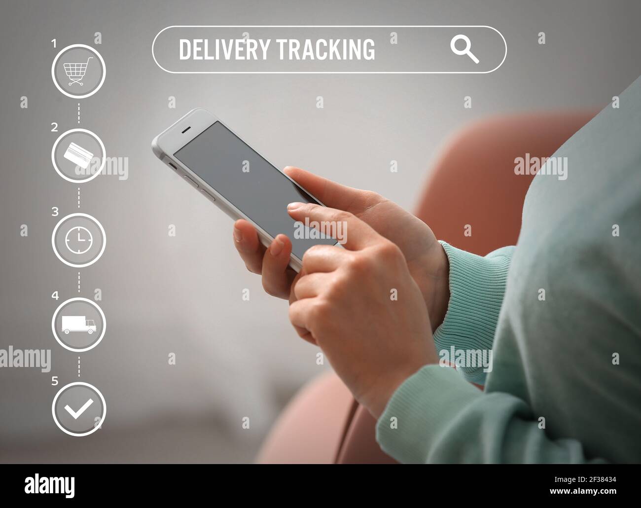 Woman with mobile phone using delivery service application Stock Photo ...