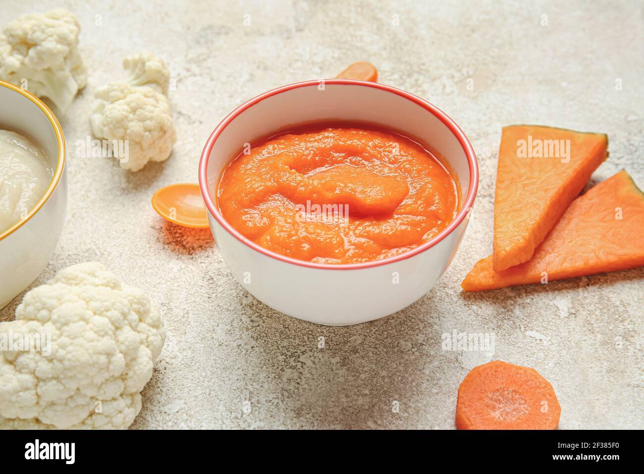 Composition with healthy baby food and ingredients on light background ...