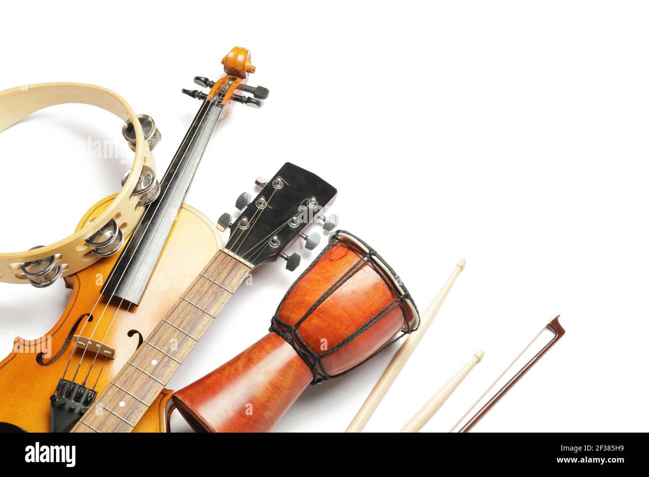 Different musical instruments on white background Stock Photo - Alamy