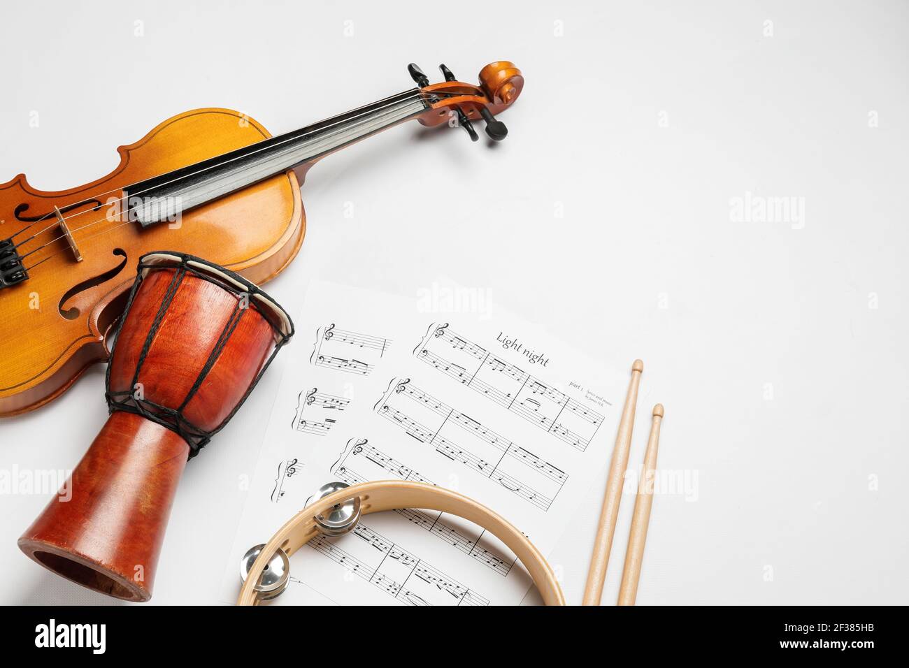 Different musical instruments and music notes on white background Stock ...