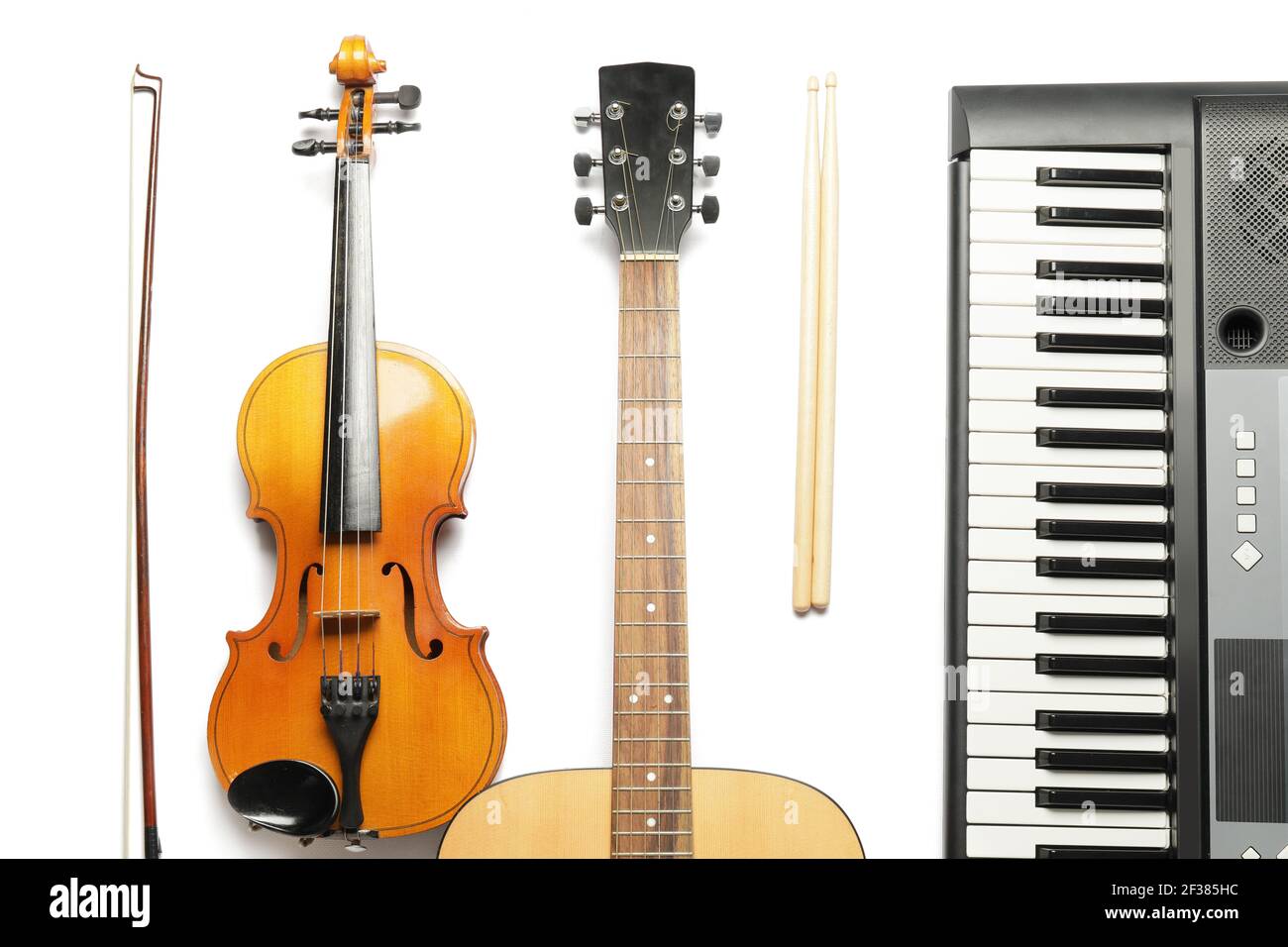 Different musical instruments on white background Stock Photo - Alamy