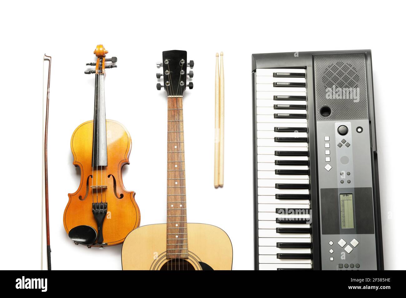 Different musical instruments on white background Stock Photo - Alamy