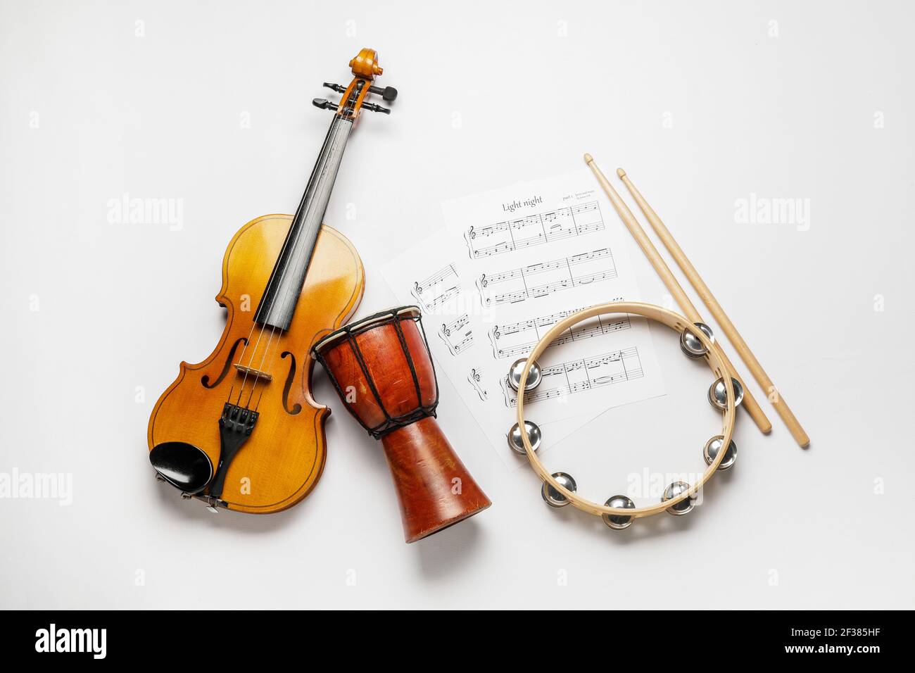 Different musical instruments and music notes on white background Stock ...