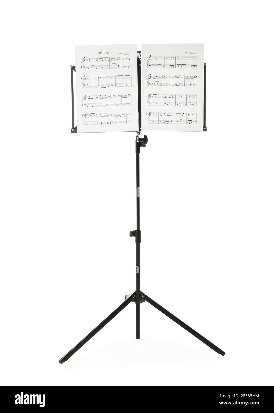 Note stand with music sheets on white background Stock Photo - Alamy