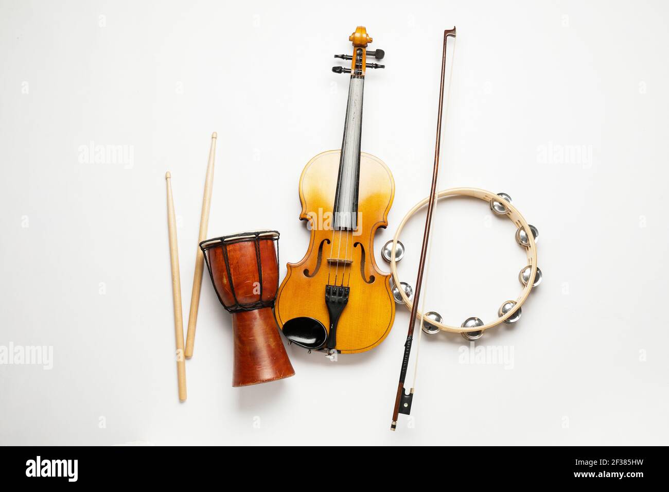 Different musical instruments on white background Stock Photo - Alamy
