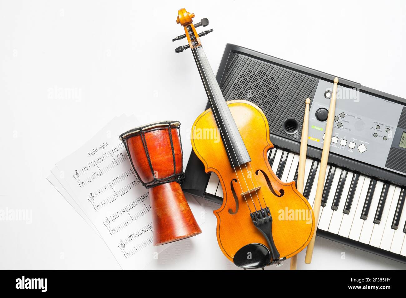 Different musical instruments and music notes on white background Stock ...