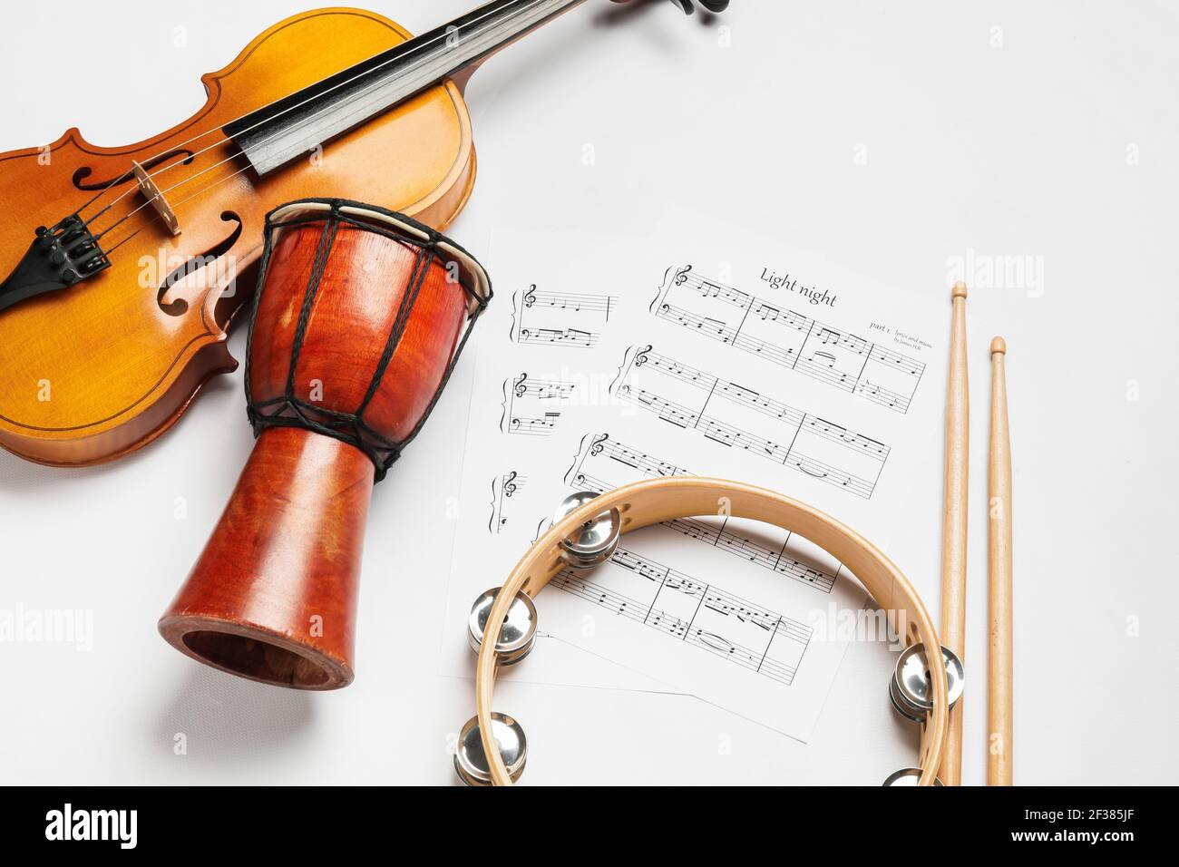 Different musical instruments and music notes on white background Stock ...