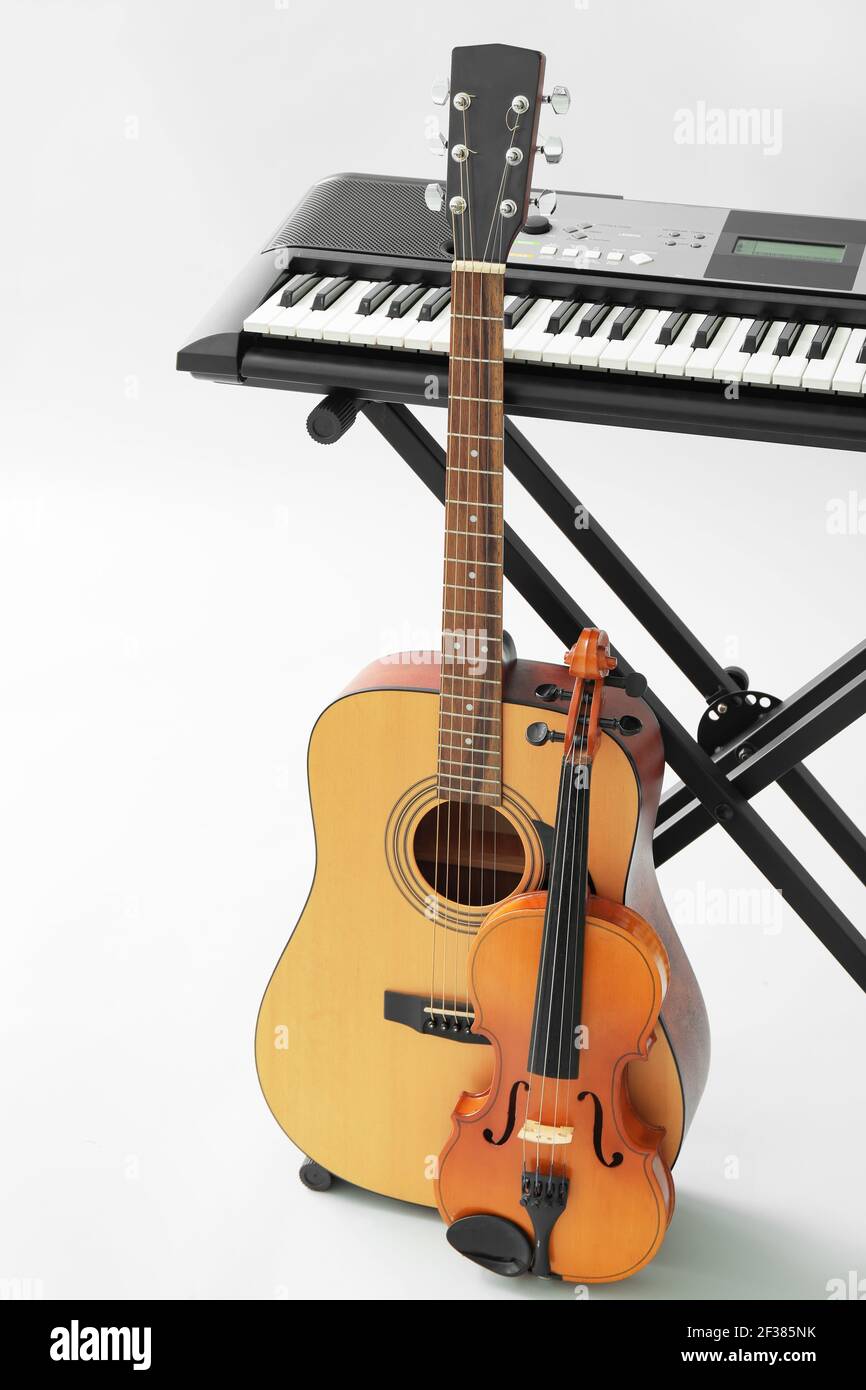 Different musical instruments on white background Stock Photo - Alamy