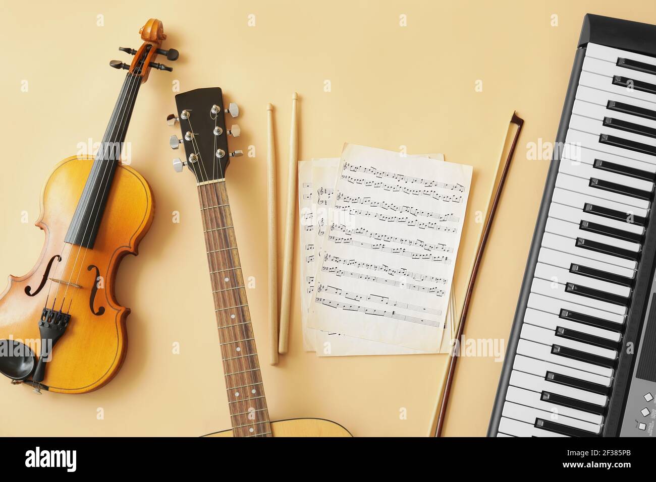 Different musical instruments and music notes on color background Stock ...