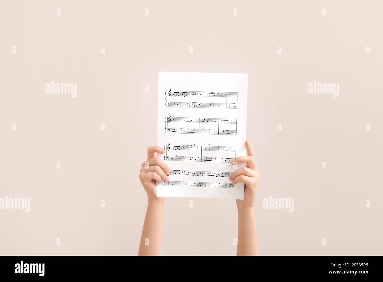 Woman with music notes hi-res stock photography and images - Alamy
