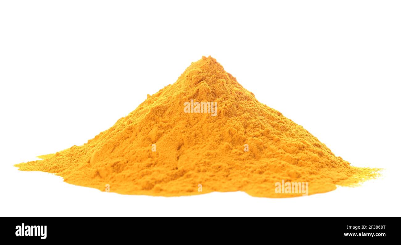 Heap of turmeric powder on white background Stock Photo - Alamy