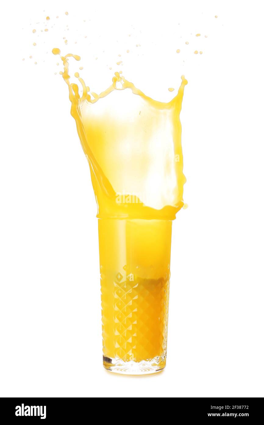 Glass of orange juice with splash on white background Stock Photo - Alamy