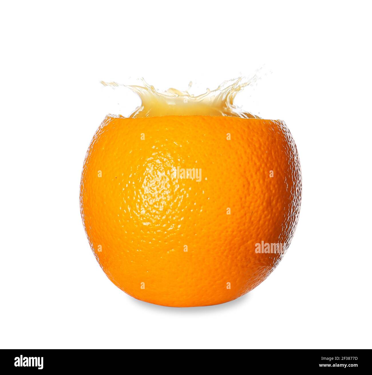 Tasty orange with splash of juice on white background Stock Photo - Alamy