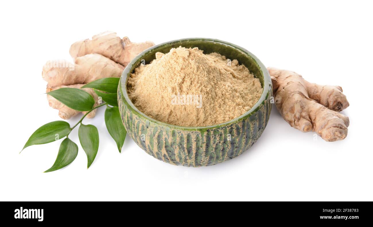 Bowl with ginger powder on white background Stock Photo - Alamy