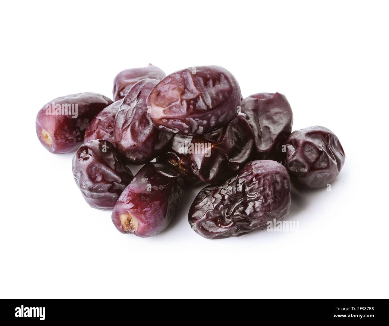 Sweet dried dates on white background Stock Photo - Alamy