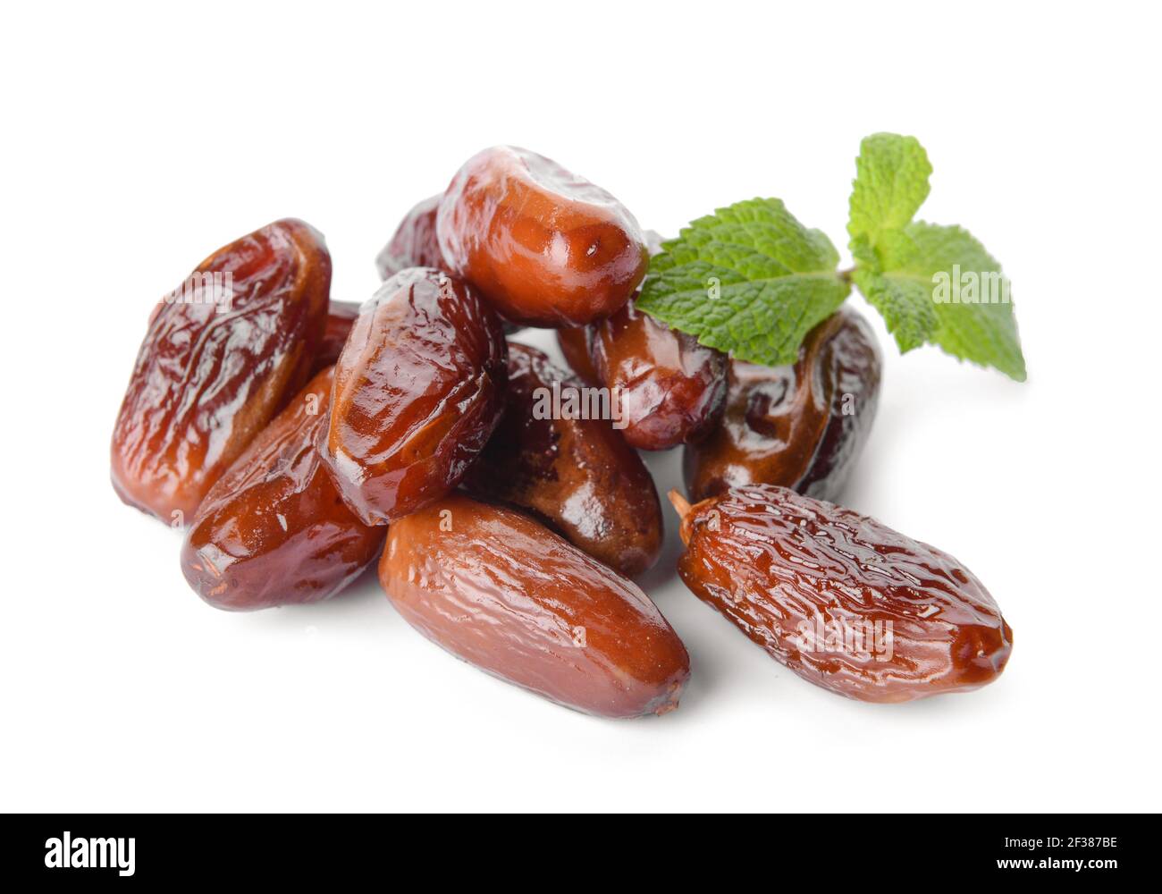 Sweet dried dates on white background Stock Photo - Alamy
