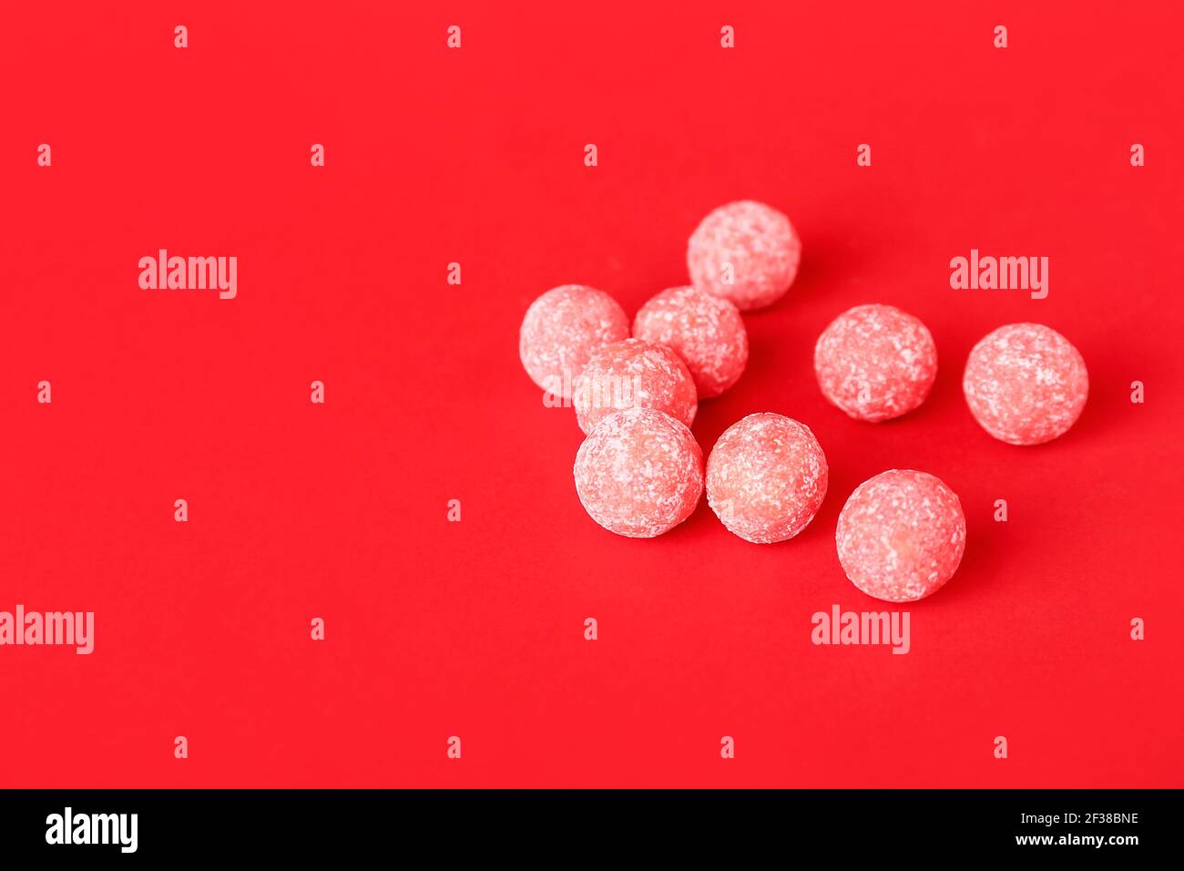 Tasty chewing gums on color background Stock Photo - Alamy