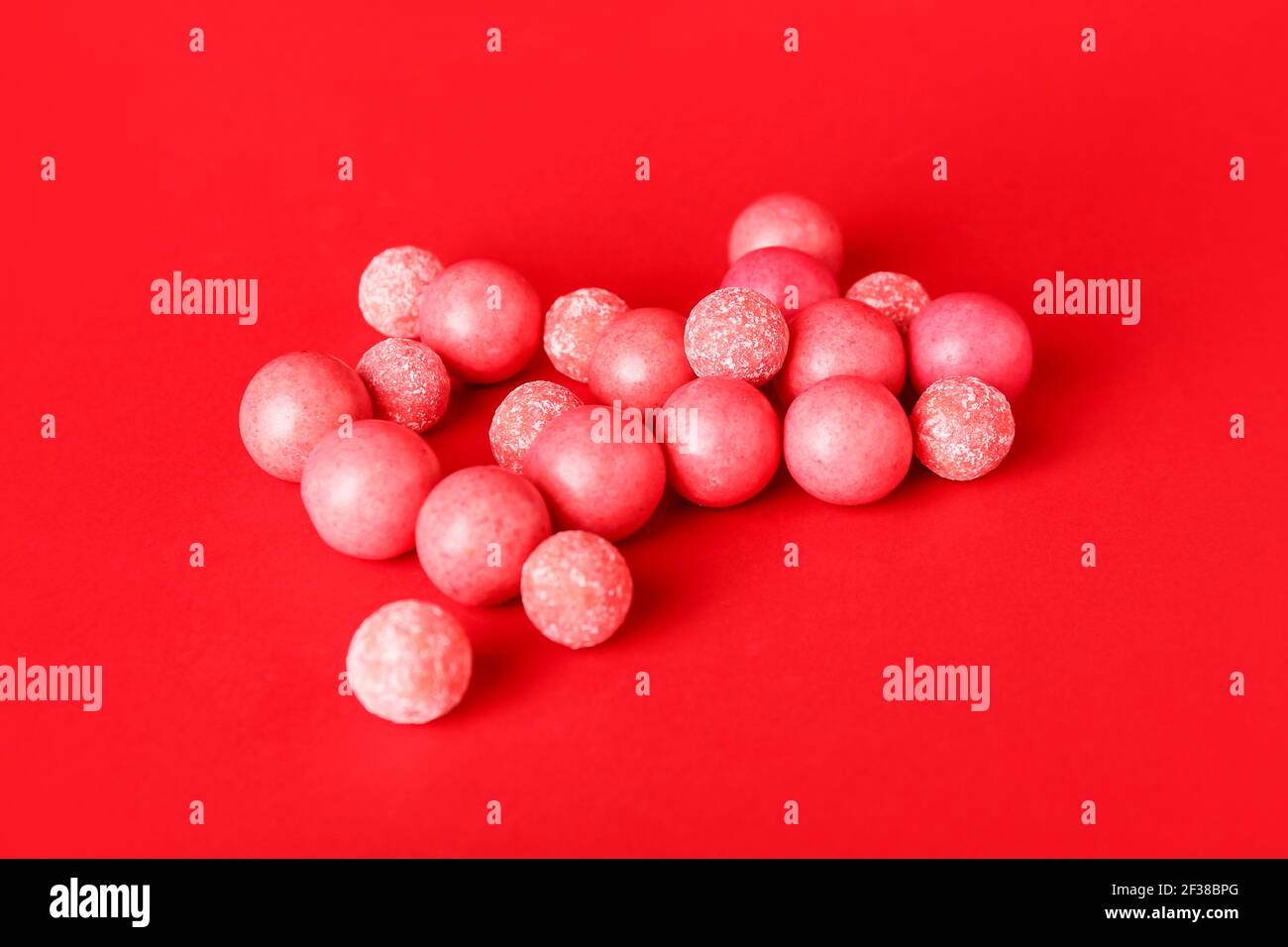 Tasty chewing gums on color background Stock Photo - Alamy