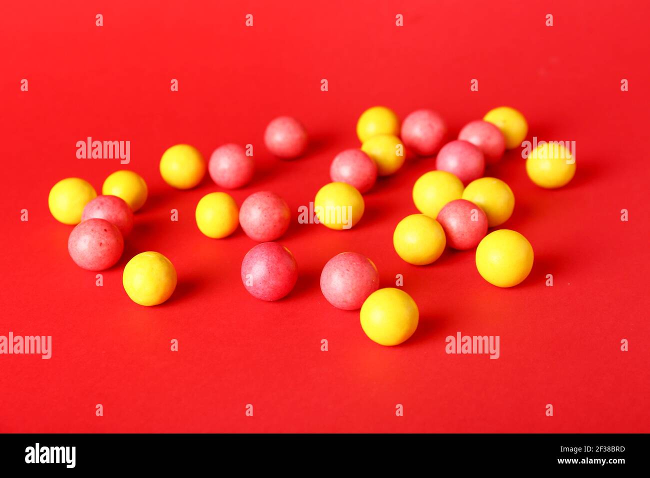 Tasty chewing gums on color background Stock Photo - Alamy