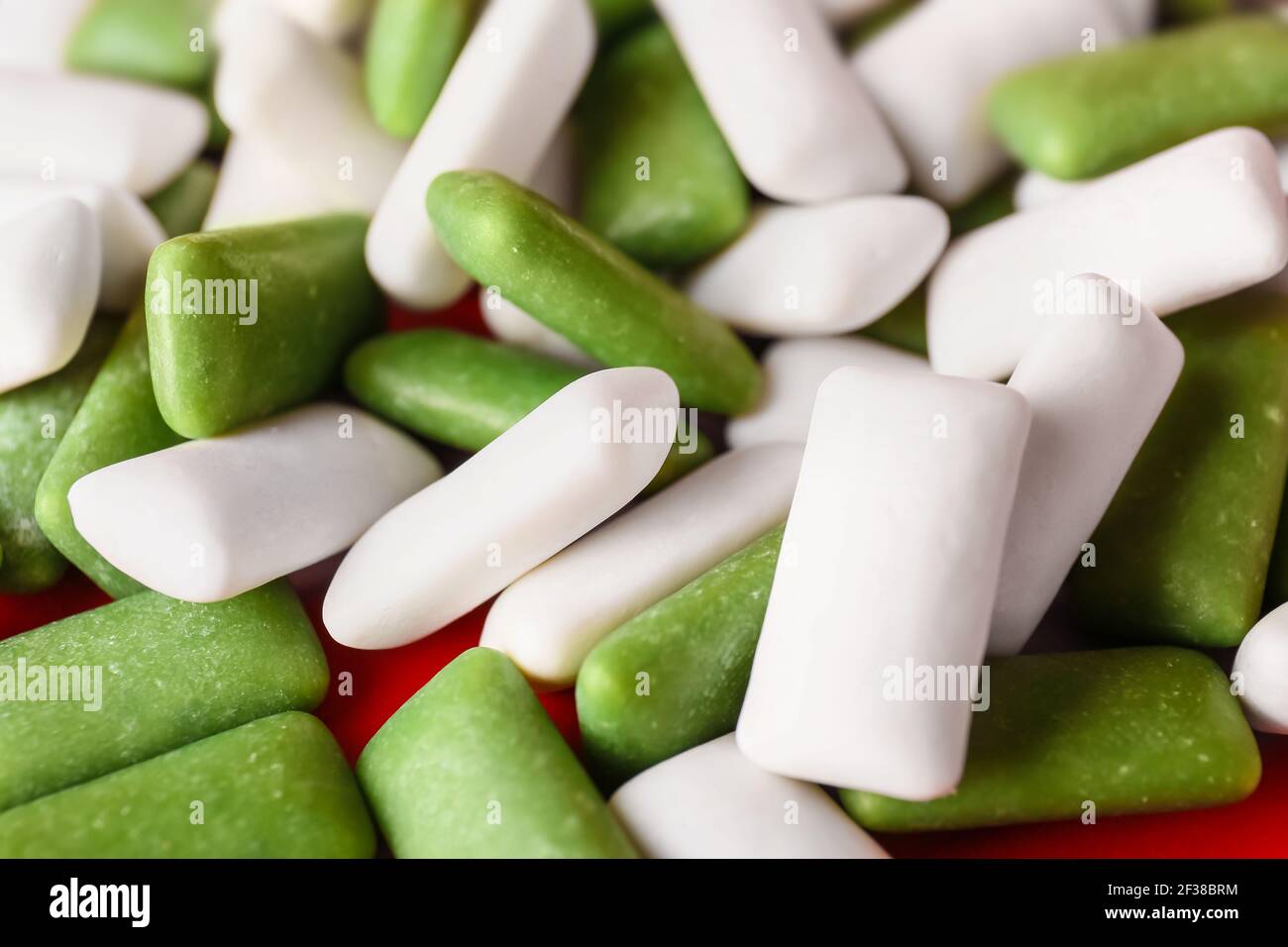 Tasty chewing gums as background Stock Photo - Alamy