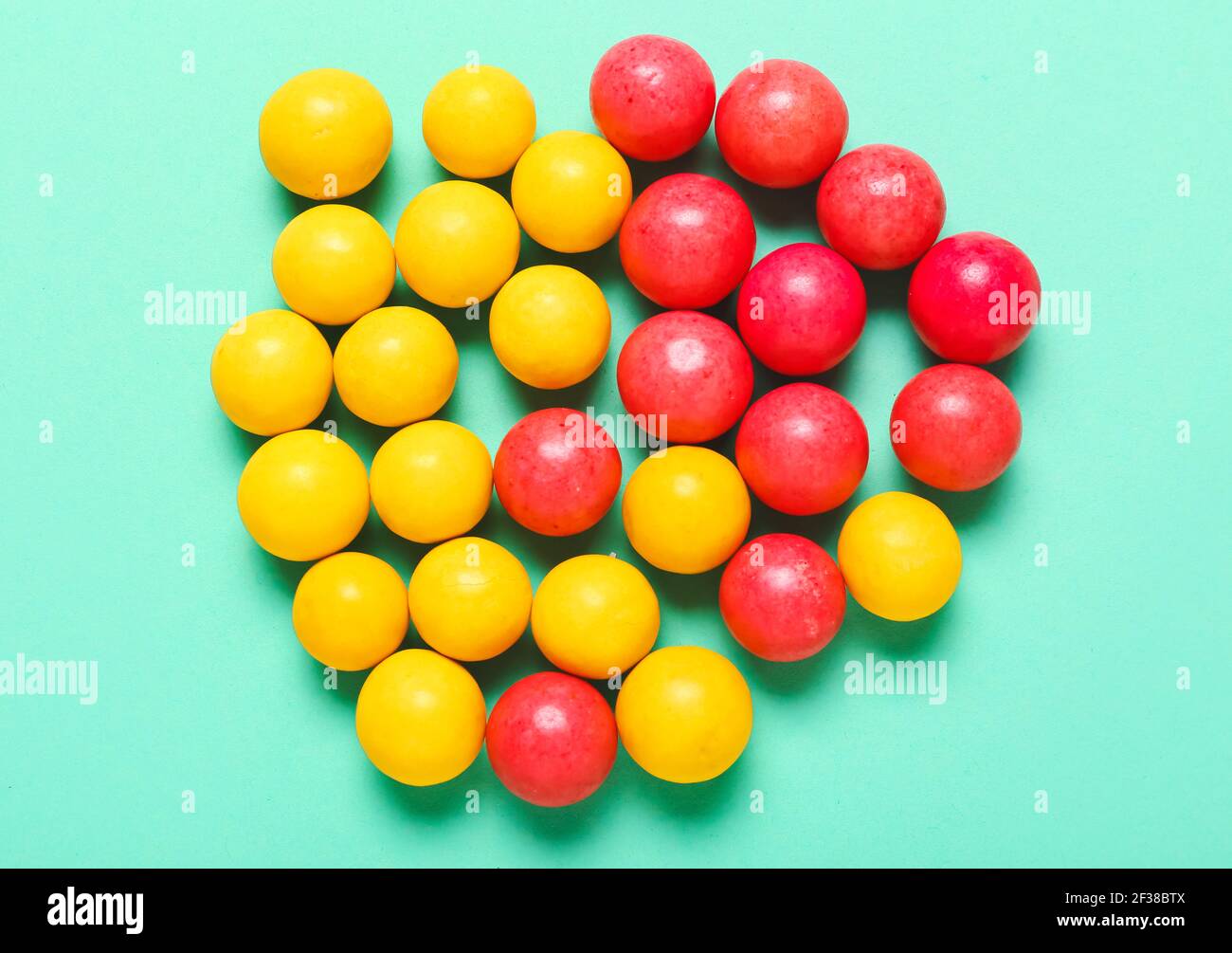 Tasty chewing gums on color background Stock Photo - Alamy