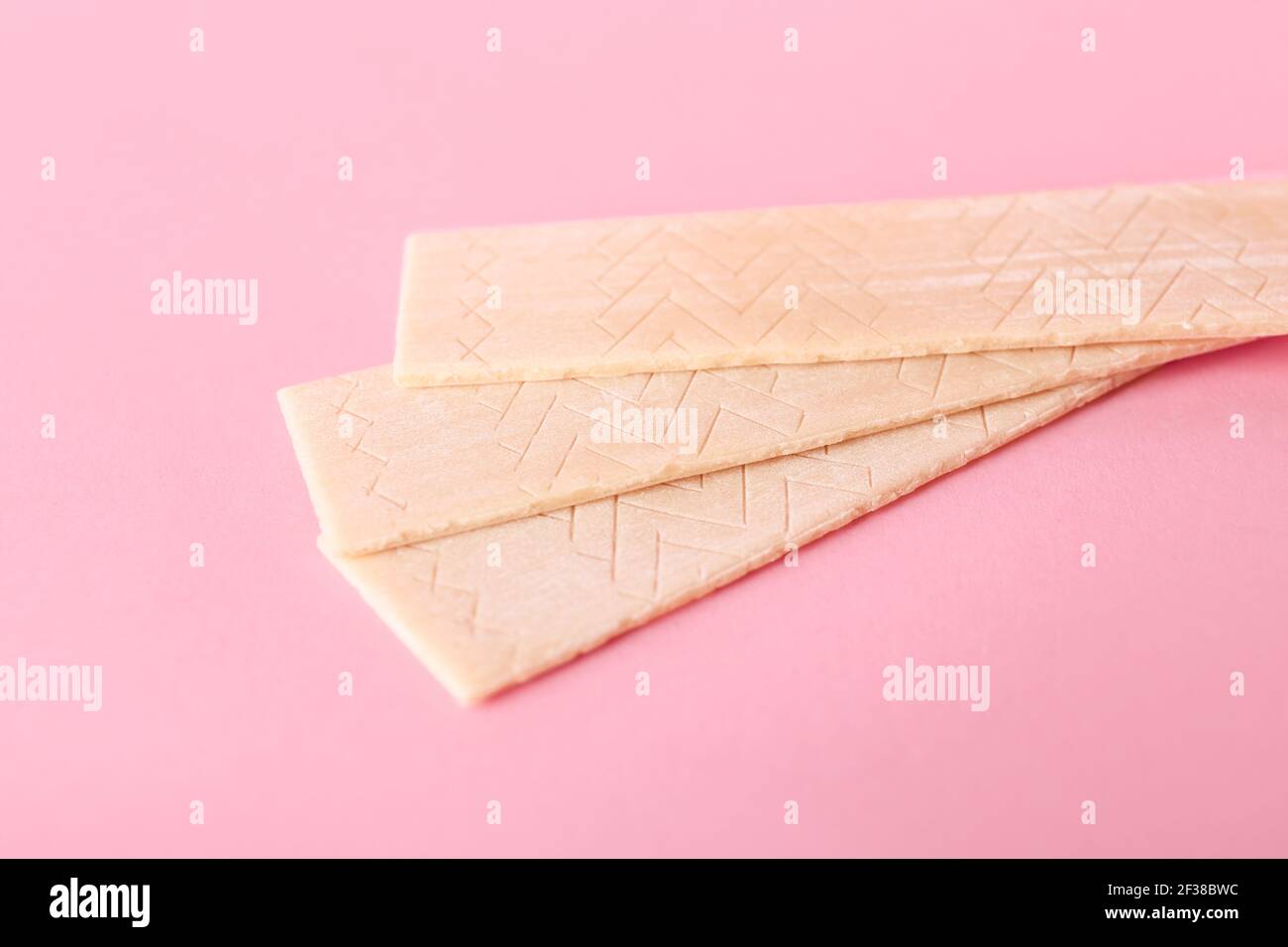 Tasty chewing gums on color background Stock Photo - Alamy