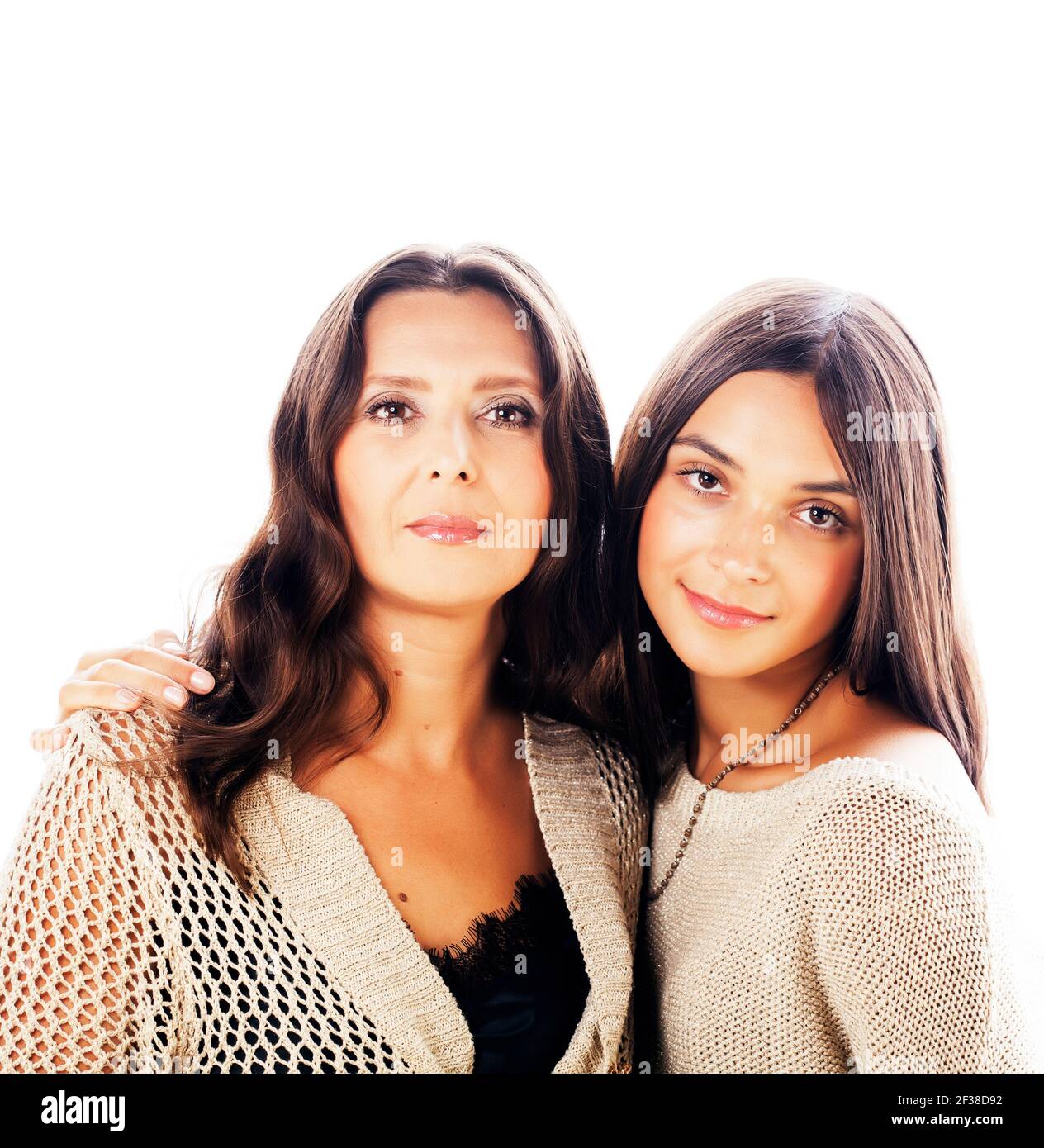 cute pretty teen daughter with mature mother hugging, fashion style ...