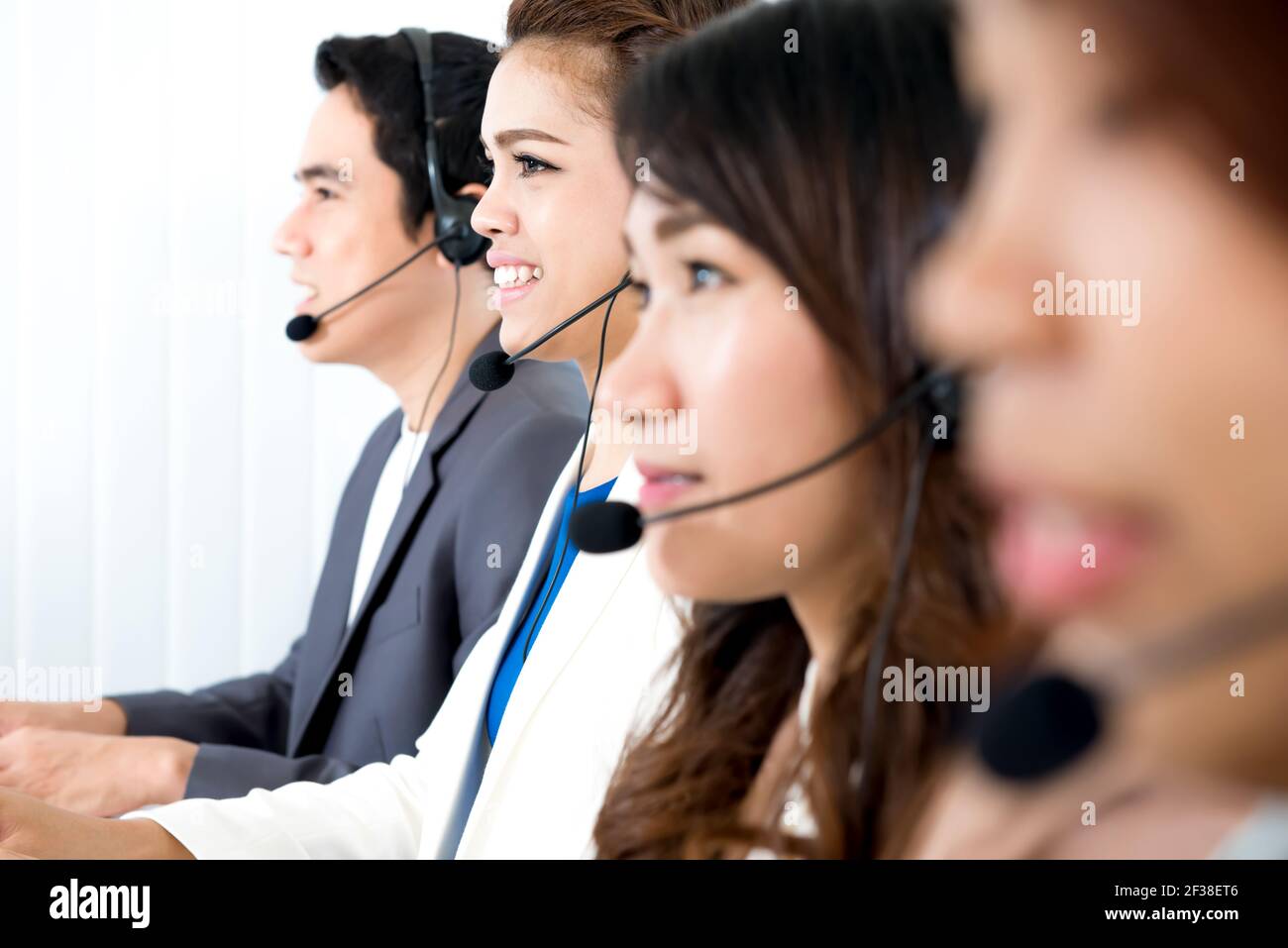 Call center (or telemarketer) team - customer service operator concept ...