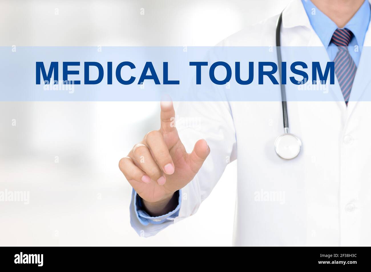 Doctor hand touching MEDICAL TOURISM sign virtual screen Stock Photo ...